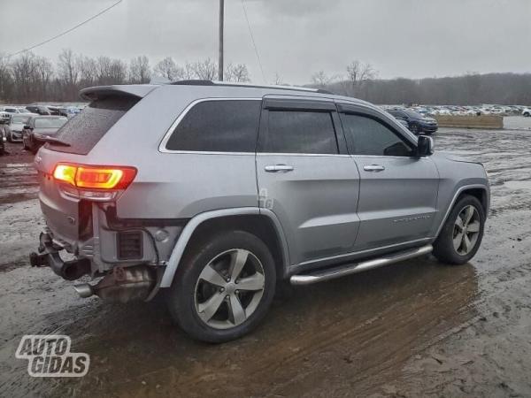 Grey Jeep Grand Cherokee 2014 in Kaunas, with an engine capacity of 5.70 L and mileage of 261 thousand km for 10700 €, photo 3 on AUTOMOTO.COM.LV