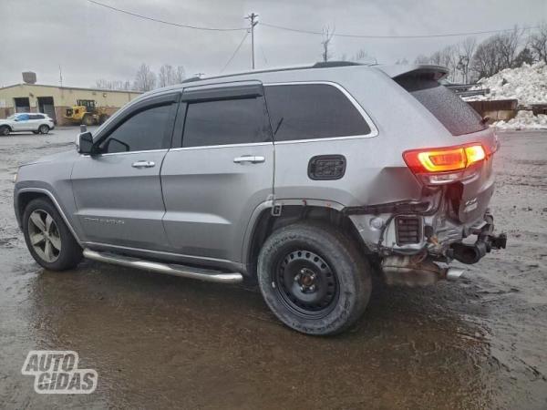 Grey Jeep Grand Cherokee 2014 in Kaunas, with an engine capacity of 5.70 L and mileage of 261 thousand km for 10700 €, photo 4 on AUTOMOTO.COM.LV