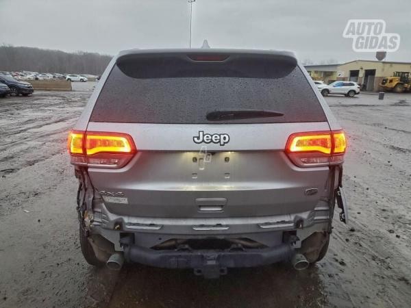 Grey Jeep Grand Cherokee 2014 in Kaunas, with an engine capacity of 5.70 L and mileage of 261 thousand km for 10700 €, photo 6 on AUTOMOTO.COM.LV