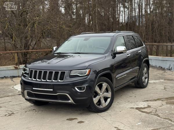 Grey Jeep Grand Cherokee 2014 in Vilnius, with an engine capacity of 5.70 L and mileage of 143 thousand km for 15500 €, photo 1 on AUTOMOTO.COM.LV