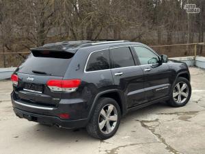 Pelēks Jeep Grand Cherokee 2014 Viļņa, ar dzinēja tilpumu 5.70 L un nobraukumu 143 tūkst. km par 15500 €, foto 3 vietnē AUTOMOTO.COM.LV