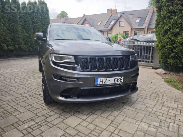 Pelēks Jeep Grand Cherokee 2014 Rīga, ar dzinēja tilpumu 6.40 L un nobraukumu 0 tūkst. km par 24500 €, foto 8 vietnē AUTOMOTO.COM.LV