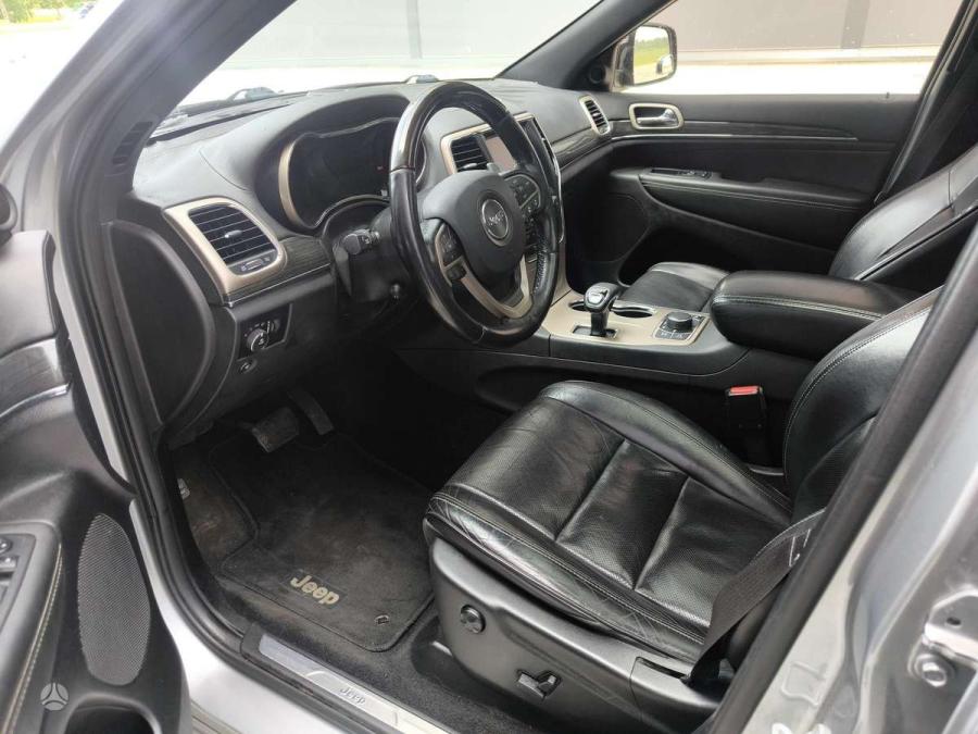 Pelēks Jeep Grand Cherokee 2014 Šauļi, ar dzinēja tilpumu 3.60 L un nobraukumu 264 tūkst. km par 8500 €, foto 11 vietnē AUTOMOTO.COM.LV