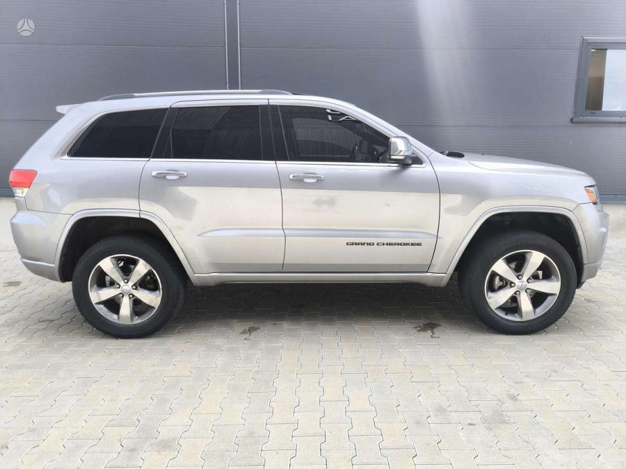 Pelēks Jeep Grand Cherokee 2014 Šauļi, ar dzinēja tilpumu 3.60 L un nobraukumu 264 tūkst. km par 8500 €, foto 27 vietnē AUTOMOTO.COM.LV