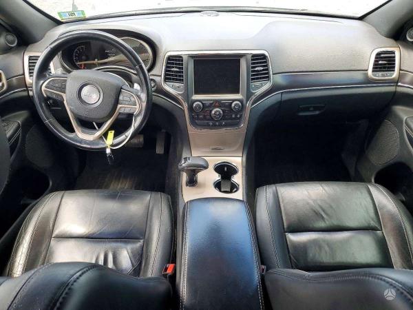 Grey Jeep Grand Cherokee 2014 in Siauliai, with an engine capacity of 3.60 L and mileage of 280 thousand km for 7878 €, photo 6 on AUTOMOTO.COM.LV