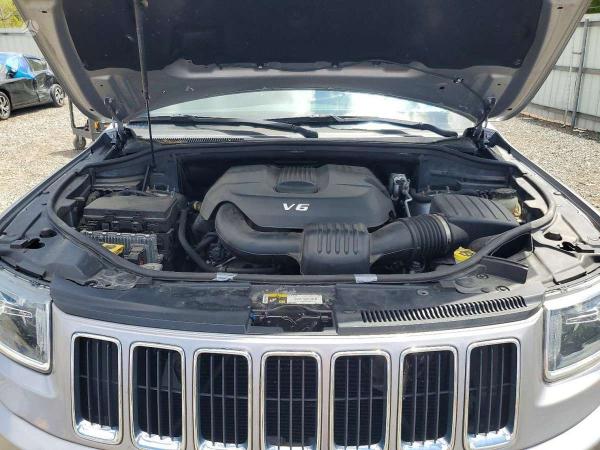 Grey Jeep Grand Cherokee 2014 in Siauliai, with an engine capacity of 3.60 L and mileage of 280 thousand km for 7878 €, photo 9 on AUTOMOTO.COM.LV