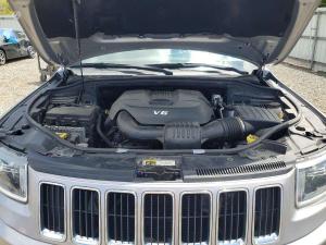 Grey Jeep Grand Cherokee 2014 in Siauliai, with an engine capacity of 3.60 L and mileage of 280 thousand km for 7878 €, photo 10 on AUTOMOTO.COM.LV