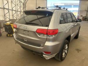 Grey Jeep Grand Cherokee 2014 in Siauliai, with an engine capacity of 3.60 L and mileage of 280 thousand km for 7878 €, photo 13 on AUTOMOTO.COM.LV
