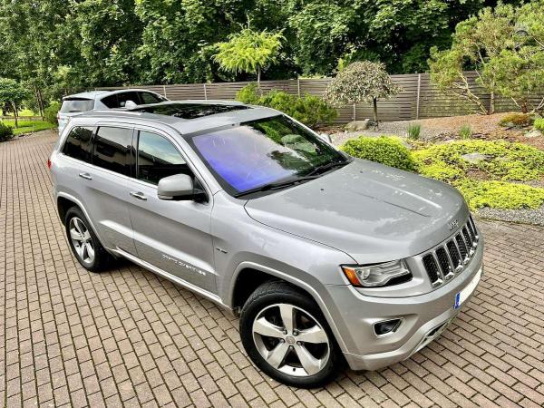 Pelēks Jeep Grand Cherokee 2014 Kauņa, ar dzinēja tilpumu 5.65 L un nobraukumu 211 tūkst. km par 16300 €, foto 2 vietnē AUTOMOTO.COM.LV