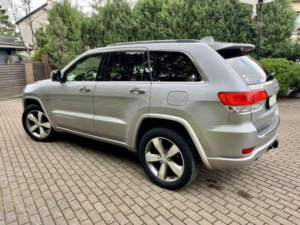 Pelēks Jeep Grand Cherokee 2014 Kauņa, ar dzinēja tilpumu 5.65 L un nobraukumu 211 tūkst. km par 16300 €, foto 5 vietnē AUTOMOTO.COM.LV