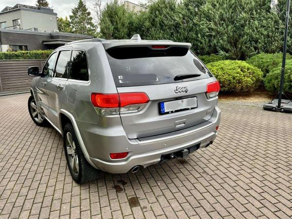 Pelēks Jeep Grand Cherokee 2014 Kauņa, ar dzinēja tilpumu 5.65 L un nobraukumu 211 tūkst. km par 16300 €, foto 6 vietnē AUTOMOTO.COM.LV