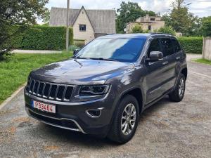 Pelēks Jeep Grand Cherokee 2014 Kauņa, ar dzinēja tilpumu 3.60 L un nobraukumu 198 tūkst. km par 12500 €, foto  vietnē AUTOMOTO.COM.LV