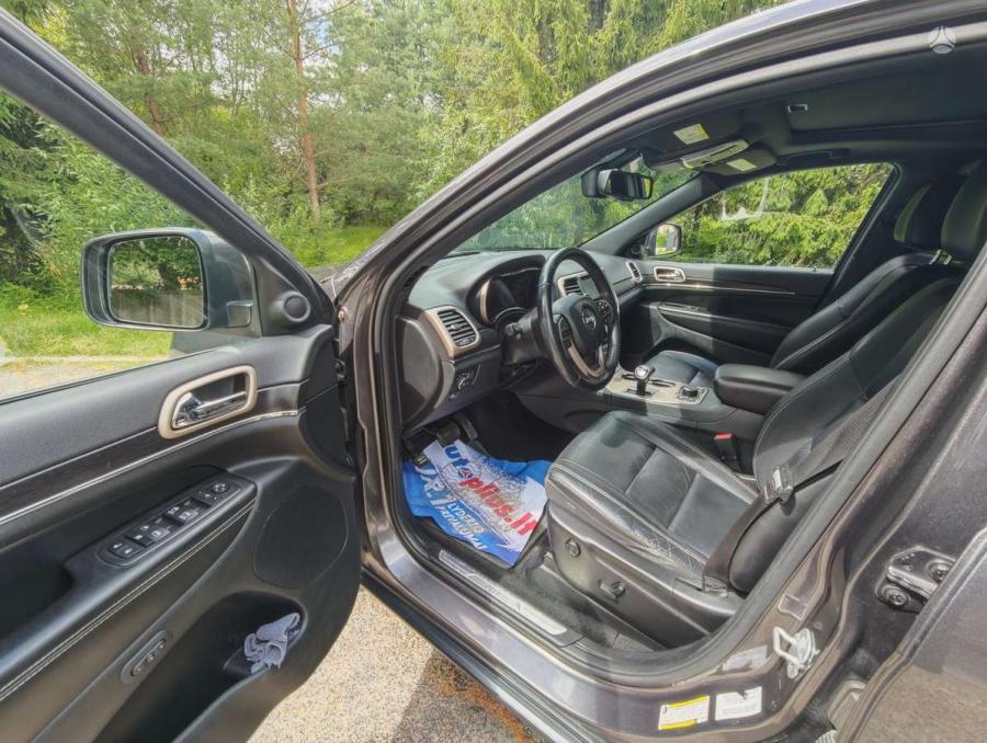Pelēks Jeep Grand Cherokee 2014 Kauņa, ar dzinēja tilpumu 3.60 L un nobraukumu 198 tūkst. km par 12500 €, foto 12 vietnē AUTOMOTO.COM.LV