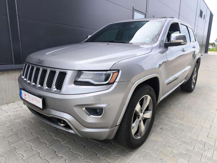 Pelēks Jeep Grand Cherokee 2014 Šauļi, ar dzinēja tilpumu 3.60 L un nobraukumu 264 tūkst. km par 7900 €, foto 1 vietnē AUTOMOTO.COM.LV