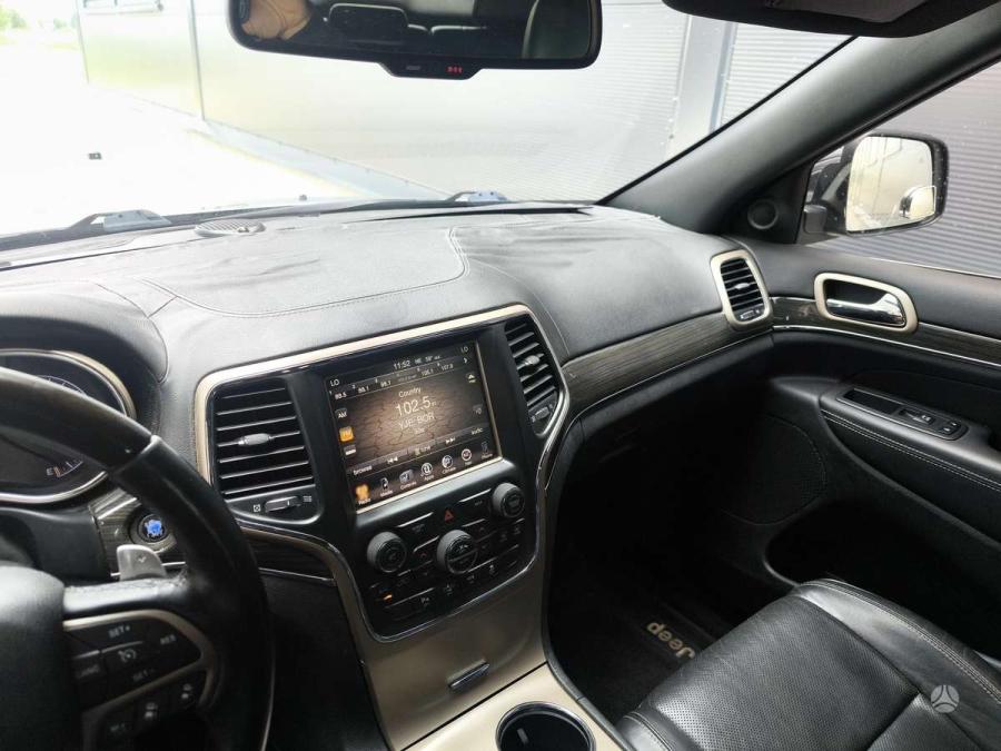 Pelēks Jeep Grand Cherokee 2014 Šauļi, ar dzinēja tilpumu 3.60 L un nobraukumu 264 tūkst. km par 7900 €, foto 18 vietnē AUTOMOTO.COM.LV