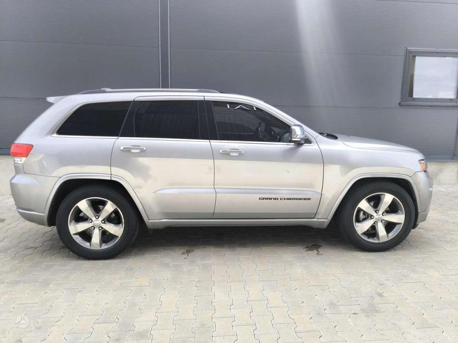 Pelēks Jeep Grand Cherokee 2014 Šauļi, ar dzinēja tilpumu 3.60 L un nobraukumu 264 tūkst. km par 7900 €, foto 27 vietnē AUTOMOTO.COM.LV