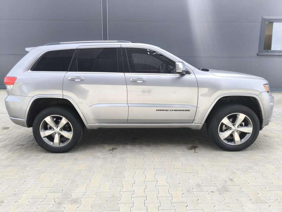 Pelēks Jeep Grand Cherokee 2014 Šauļi, ar dzinēja tilpumu 3.60 L un nobraukumu 264 tūkst. km par 7900 €, foto 28 vietnē AUTOMOTO.COM.LV