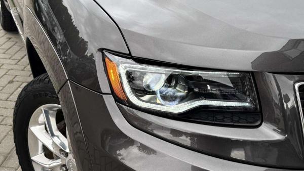 Grey Jeep Grand Cherokee 2014 in Radviliskis, with an engine capacity of 3.60 L and mileage of 215 thousand km for 14850 €, photo 9 on AUTOMOTO.COM.LV