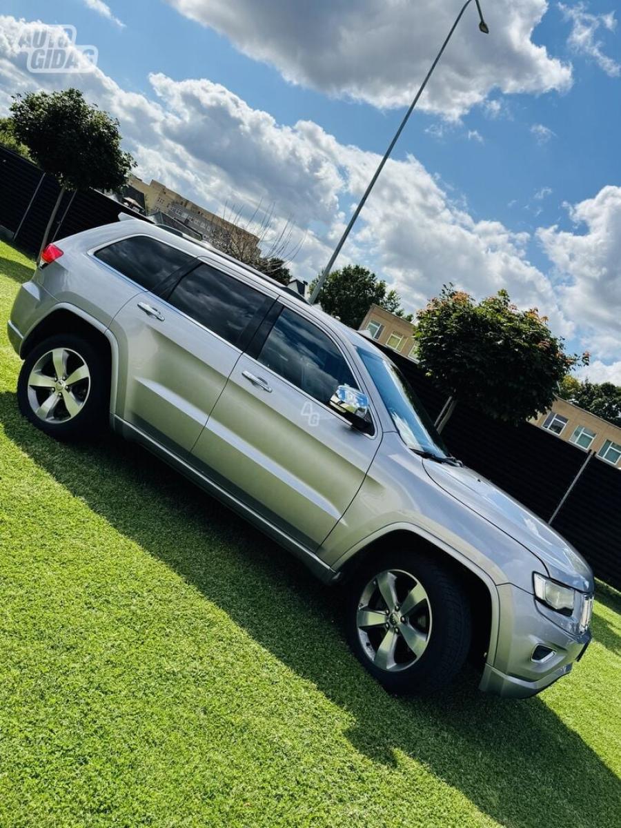Pelēks Jeep Grand Cherokee 2014 Mažeikiai, ar dzinēja tilpumu 5.70 L un nobraukumu 249 tūkst. km par 14800 €, foto 1 vietnē AUTOMOTO.COM.LV