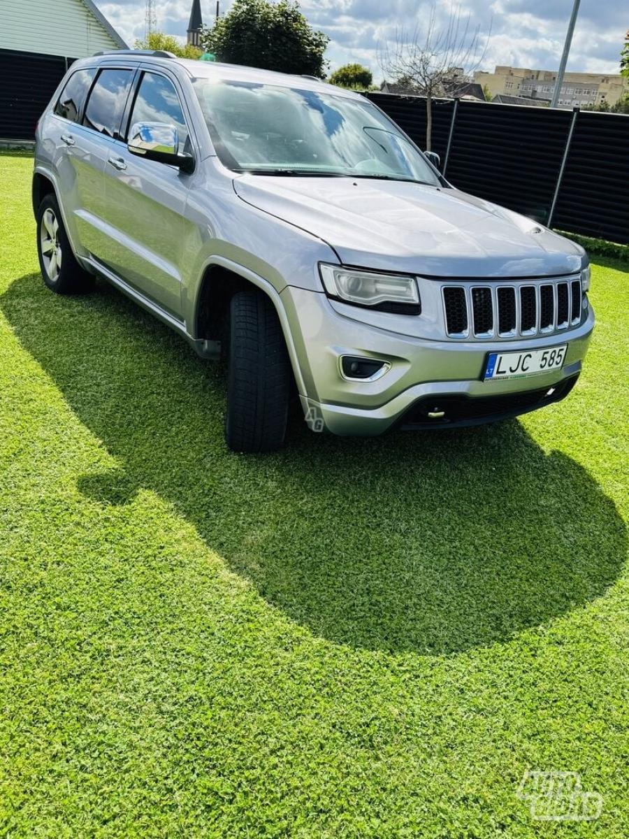 Pelēks Jeep Grand Cherokee 2014 Mažeikiai, ar dzinēja tilpumu 5.70 L un nobraukumu 249 tūkst. km par 14800 €, foto 4 vietnē AUTOMOTO.COM.LV