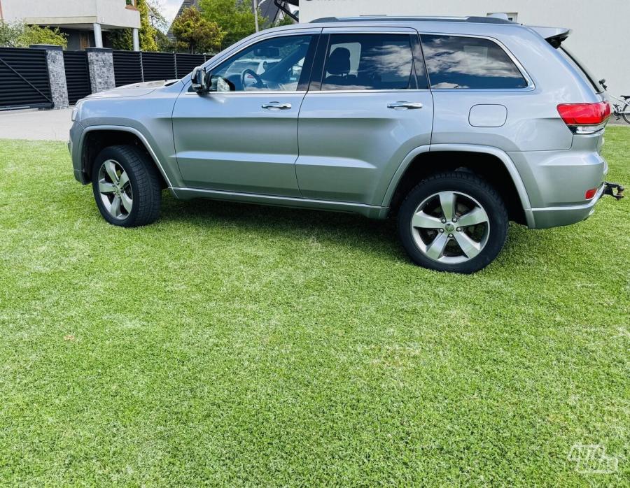 Pelēks Jeep Grand Cherokee 2014 Mažeikiai, ar dzinēja tilpumu 5.70 L un nobraukumu 249 tūkst. km par 14800 €, foto 18 vietnē AUTOMOTO.COM.LV