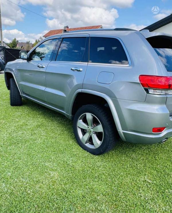 Pelēks Jeep Grand Cherokee 2014 Mažeikiai, ar dzinēja tilpumu 5.70 L un nobraukumu 249 tūkst. km par 13900 €, foto 4 vietnē AUTOMOTO.COM.LV