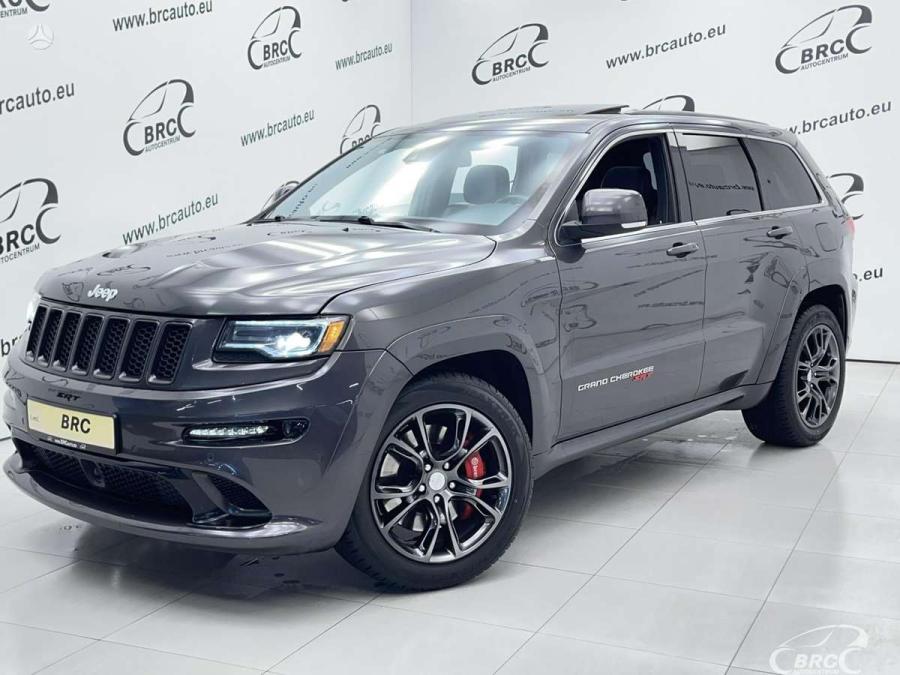 Pelēks Jeep Grand Cherokee 2014 Viļņa, ar dzinēja tilpumu 6.42 L un nobraukumu 198 tūkst. km par 15000 €, foto 1 vietnē AUTOMOTO.COM.LV