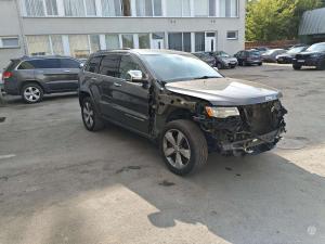 Pelēks Jeep Grand Cherokee 2014 Kauņa, ar dzinēja tilpumu 5.65 L un nobraukumu 193 tūkst. km par 8900 €, foto  vietnē AUTOMOTO.COM.LV