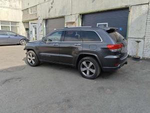 Grey Jeep Grand Cherokee 2014 in Kaunas, with an engine capacity of 5.65 L and mileage of 193 thousand km for 8900 €, photo 4 on AUTOMOTO.COM.LV
