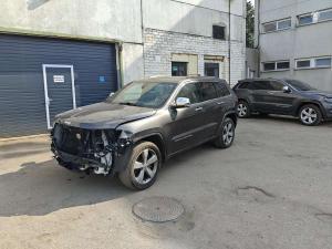 Grey Jeep Grand Cherokee 2014 in Kaunas, with an engine capacity of 5.65 L and mileage of 193 thousand km for 8900 €, photo 5 on AUTOMOTO.COM.LV