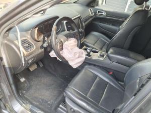 Grey Jeep Grand Cherokee 2014 in Kaunas, with an engine capacity of 5.65 L and mileage of 193 thousand km for 8900 €, photo 6 on AUTOMOTO.COM.LV