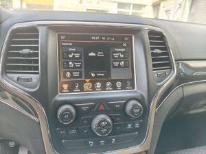 Grey Jeep Grand Cherokee 2014 in Kaunas, with an engine capacity of 5.65 L and mileage of 193 thousand km for 8900 €, photo 8 on AUTOMOTO.COM.LV