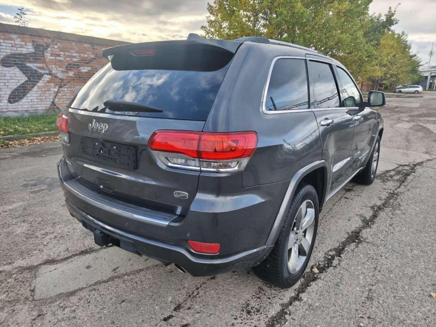 Pelēks Jeep Grand Cherokee 2014 Šauļi, ar dzinēja tilpumu 3.60 L un nobraukumu 208 tūkst. km par 11300 €, foto 4 vietnē AUTOMOTO.COM.LV