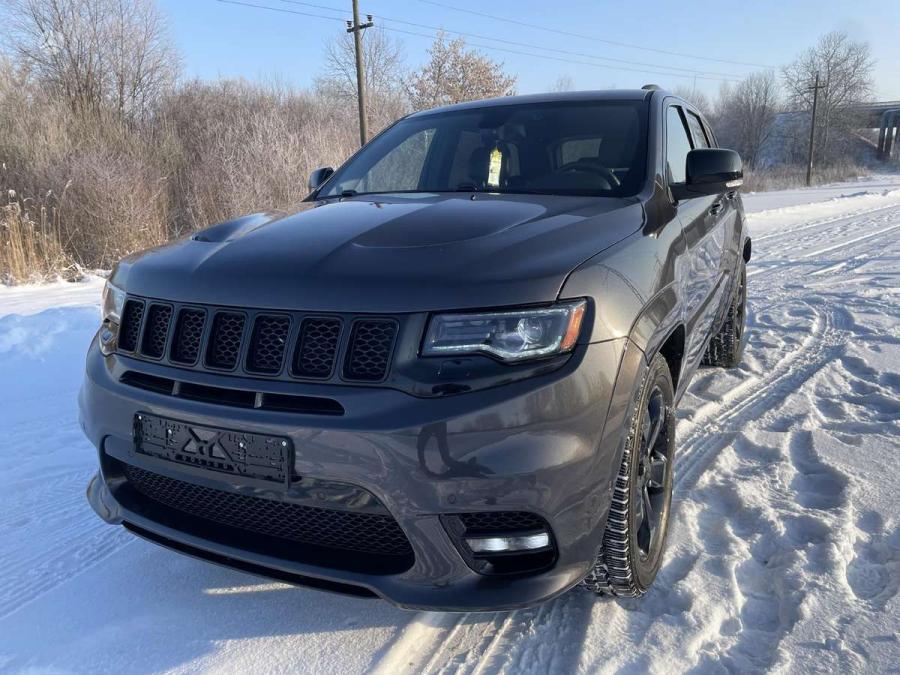 Grey Jeep Grand Cherokee 2015 in Siauliai, with an engine capacity of 3.60 L and mileage of 167 thousand km for 15800 €, photo 1 on AUTOMOTO.COM.LV
