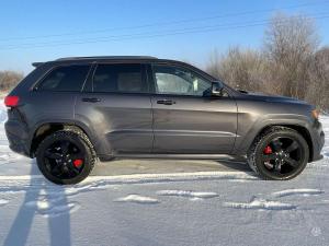 Grey Jeep Grand Cherokee 2015 in Siauliai, with an engine capacity of 3.60 L and mileage of 167 thousand km for 15800 €, photo 7 on AUTOMOTO.COM.LV