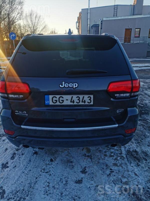 Grey Jeep Grand Cherokee 2015 in Riga, with an engine capacity of 3.00 L and mileage of 122 thousand km for 15300 €, photo 4 on AUTOMOTO.COM.LV
