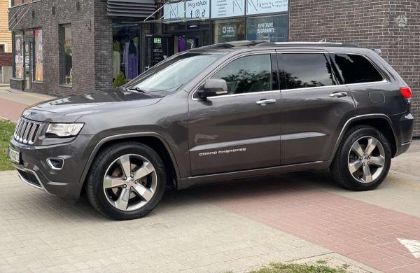 Pelēks Jeep Grand Cherokee 2015 Marijampole, ar dzinēja tilpumu 2.99 L un nobraukumu 91 tūkst. km par 17999 €, foto 5 vietnē AUTOMOTO.COM.LV