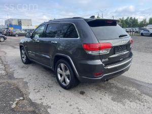 Pelēks Jeep Grand Cherokee 2015 Rīga, ar dzinēja tilpumu 3.00 L un nobraukumu 291 tūkst. km par 10900 €, foto 6 vietnē AUTOMOTO.COM.LV