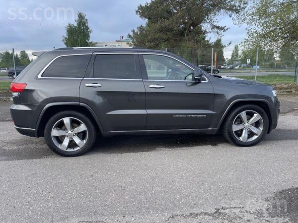 Grey Jeep Grand Cherokee 2015 in Riga, with an engine capacity of 3.00 L and mileage of 291 thousand km for 10900 €, photo 7 on AUTOMOTO.COM.LV