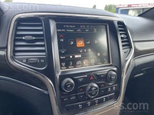 Pelēks Jeep Grand Cherokee 2015 Rīga, ar dzinēja tilpumu 3.00 L un nobraukumu 291 tūkst. km par 10900 €, foto 16 vietnē AUTOMOTO.COM.LV