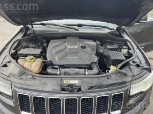 Pelēks Jeep Grand Cherokee 2015 Rīga, ar dzinēja tilpumu 3.00 L un nobraukumu 291 tūkst. km par 10900 €, foto 20 vietnē AUTOMOTO.COM.LV