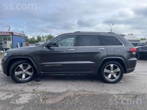 Pelēks Jeep Grand Cherokee 2015 Rīga, ar dzinēja tilpumu 3.00 L un nobraukumu 291 tūkst. km par 10900 €, foto 22 vietnē AUTOMOTO.COM.LV