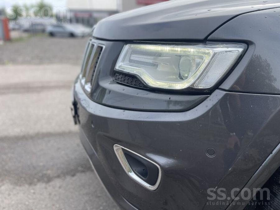 Pelēks Jeep Grand Cherokee 2015 Rīga, ar dzinēja tilpumu 3.00 L un nobraukumu 291 tūkst. km par 10900 €, foto 23 vietnē AUTOMOTO.COM.LV