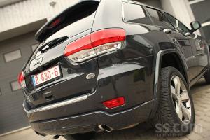 Grey Jeep Grand Cherokee 2015 in Riga, with an engine capacity of 3.00 L and mileage of 0 thousand km for 14990 €, photo 13 on AUTOMOTO.COM.LV