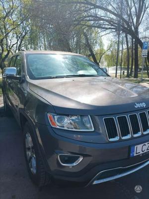 Pelēks Jeep Grand Cherokee 2015 Kauņa, ar dzinēja tilpumu 3.60 L un nobraukumu 190 tūkst. km par 15500 €, foto  vietnē AUTOMOTO.COM.LV