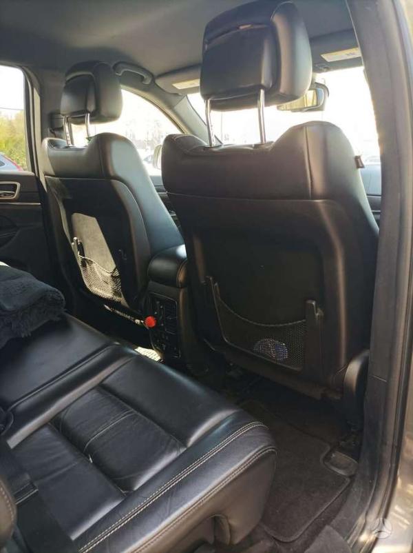 Grey Jeep Grand Cherokee 2015 in Kaunas, with an engine capacity of 3.60 L and mileage of 190 thousand km for 15500 €, photo 7 on AUTOMOTO.COM.LV
