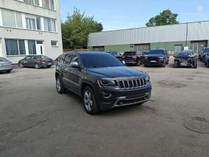 Grey Jeep Grand Cherokee 2015 in Kaunas, with an engine capacity of 5.65 L and mileage of 138 thousand km for 16500 €, photo  on AUTOMOTO.COM.LV