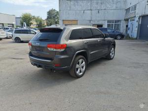 Grey Jeep Grand Cherokee 2015 in Kaunas, with an engine capacity of 5.65 L and mileage of 138 thousand km for 16500 €, photo 3 on AUTOMOTO.COM.LV