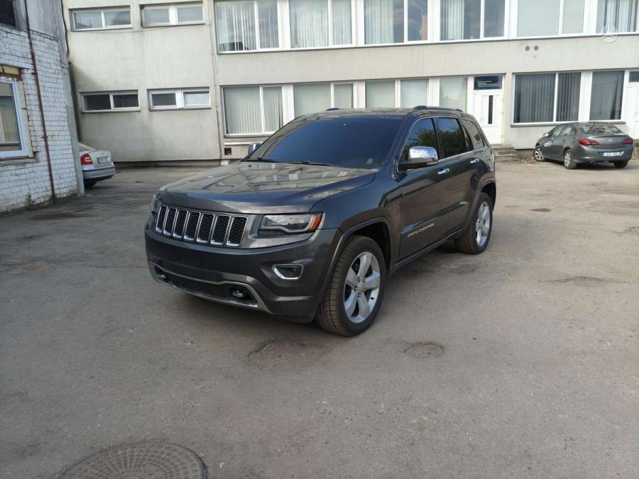 Grey Jeep Grand Cherokee 2015 in Kaunas, with an engine capacity of 5.65 L and mileage of 138 thousand km for 16500 €, photo 5 on AUTOMOTO.COM.LV