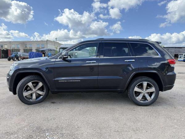 Grey Jeep Grand Cherokee 2015 in Vilnius, with an engine capacity of 2.99 L and mileage of 279 thousand km for 12990 €, photo 2 on AUTOMOTO.COM.LV